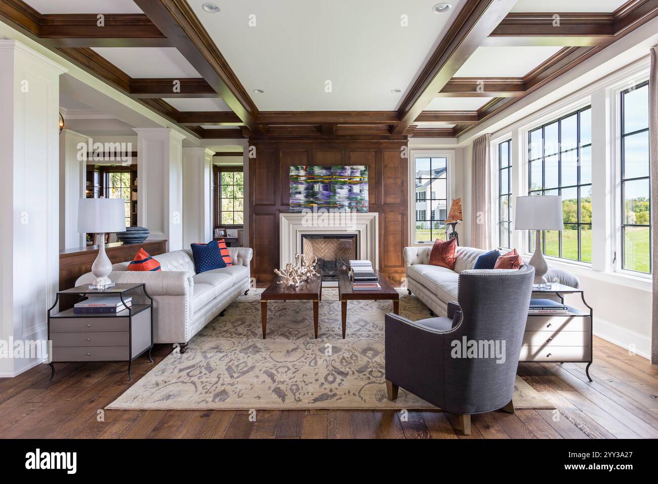 Beautiful living room with combination of white trim and casework and ...