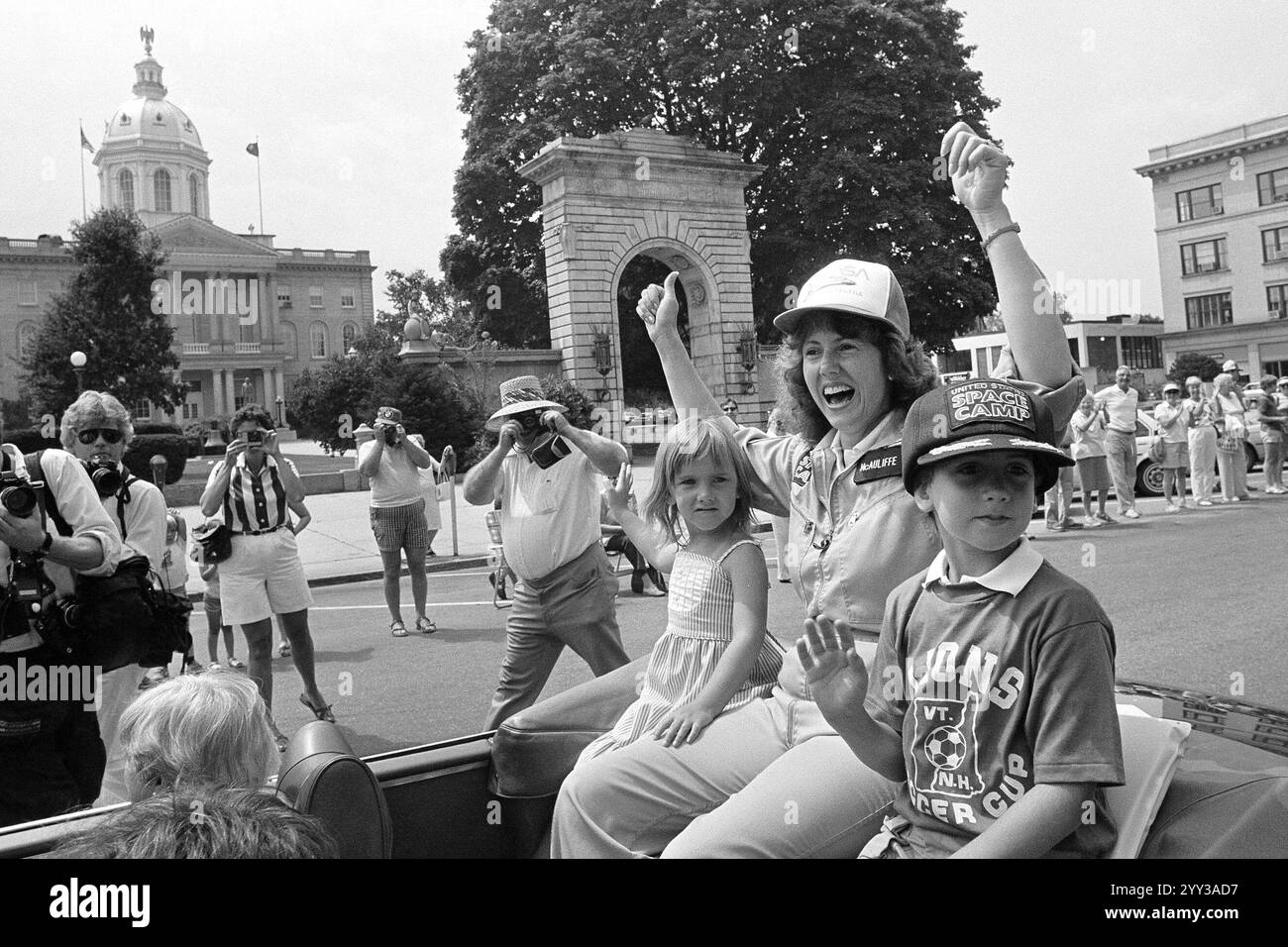 Christa McAuliffe, NASA's first teacher in space, rides with her ...
