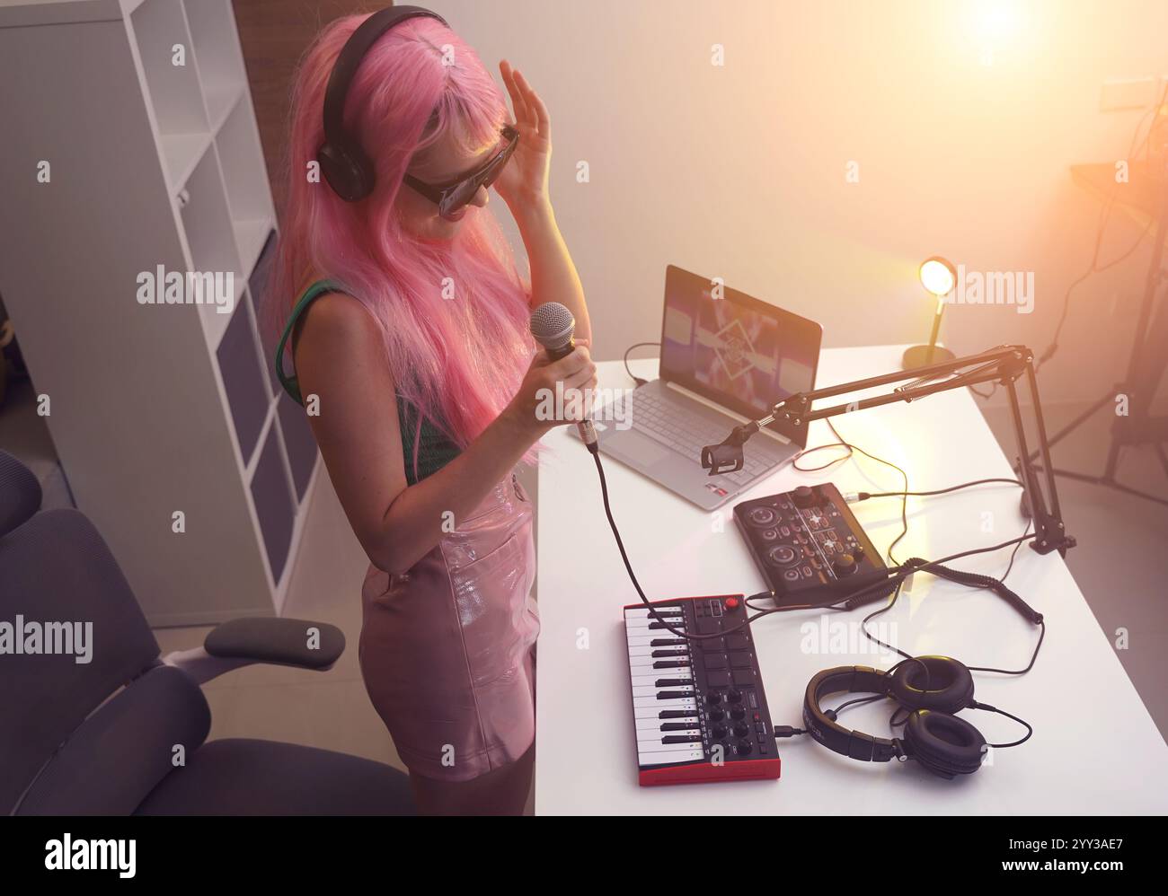 Beautiful young singer and musician broadcast from her home studio ...