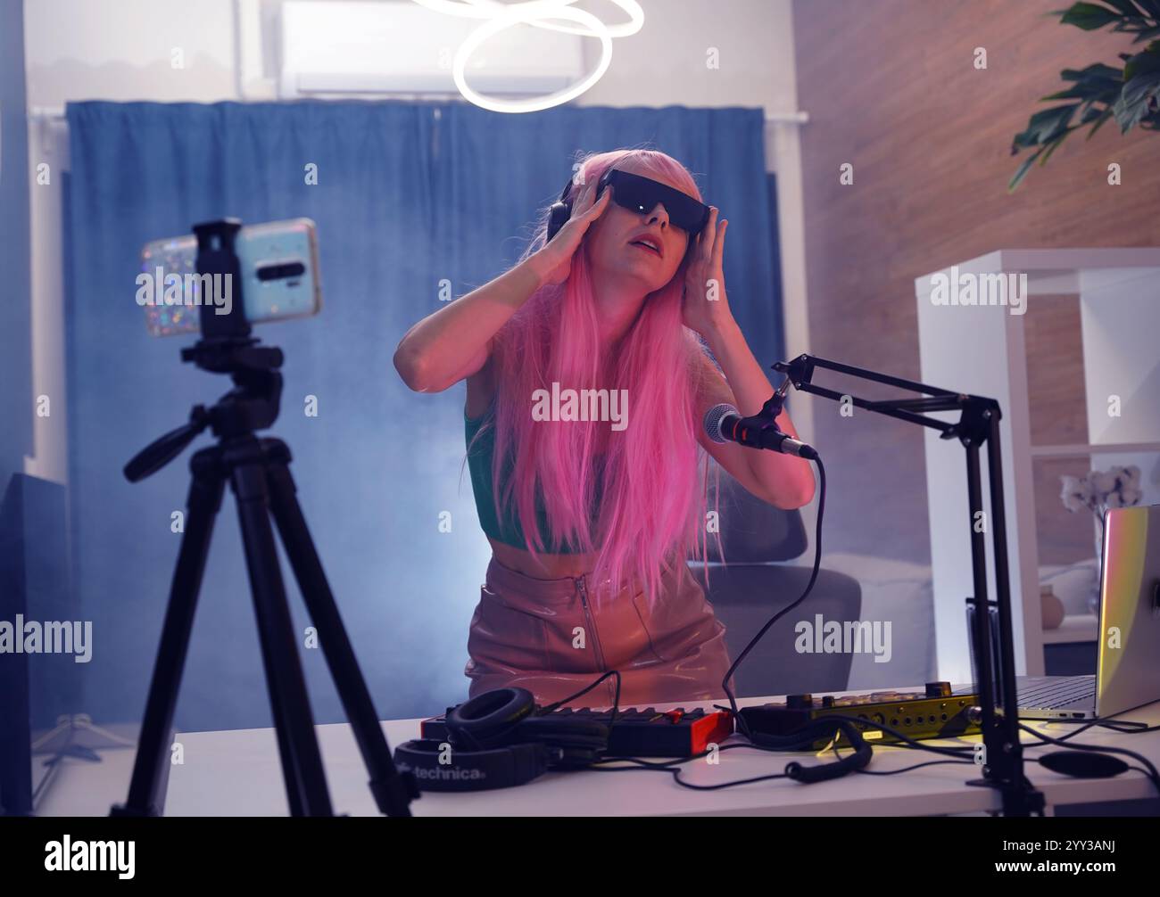 Beautiful young singer and musician broadcast from her home studio ...