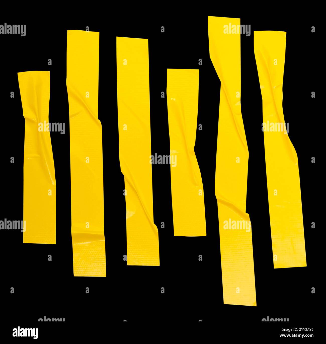 Top view set of wrinkled or crumpled yellow adhesive vinyl tape or ...