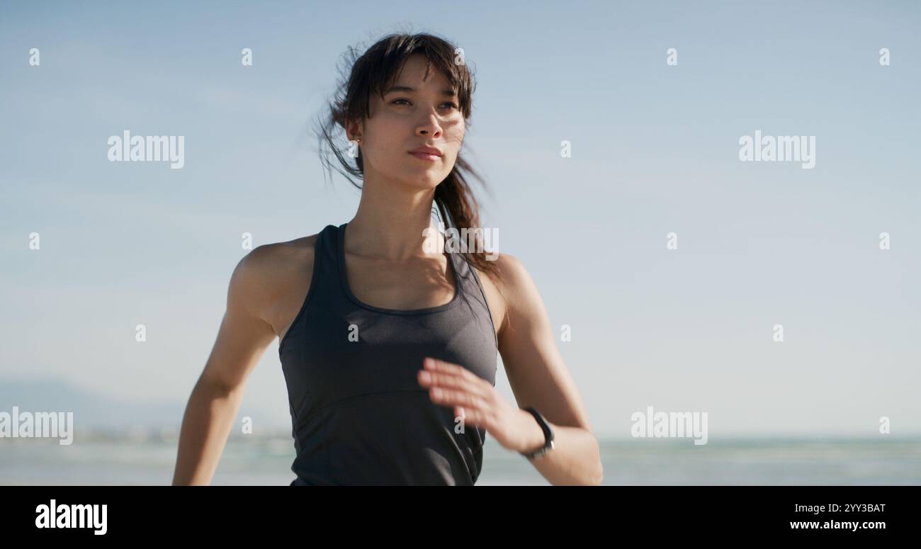 Fitness, woman and running on beach for exercise, wellness and ...