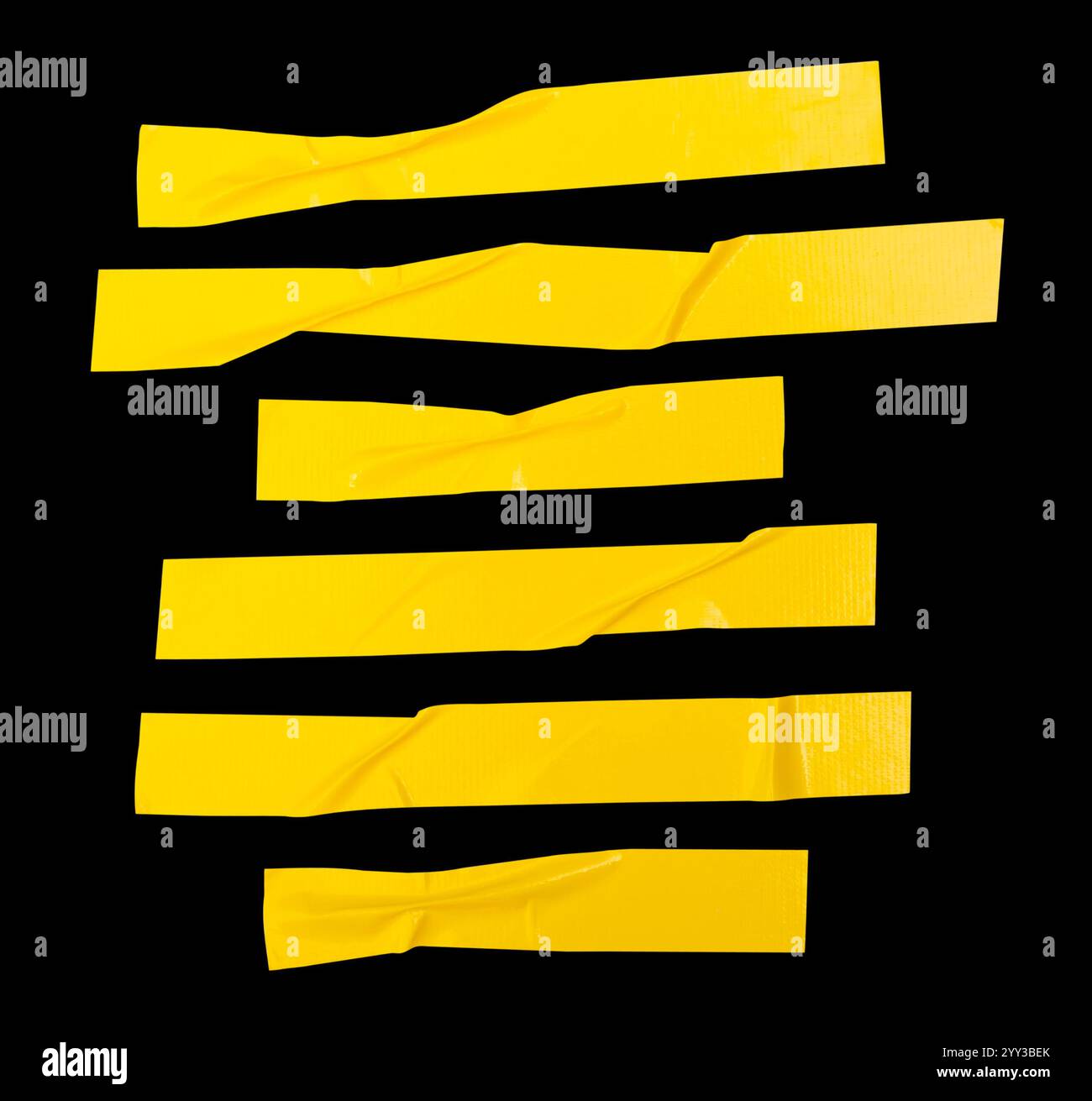 Top view set of wrinkled or crumpled yellow adhesive vinyl tape or ...