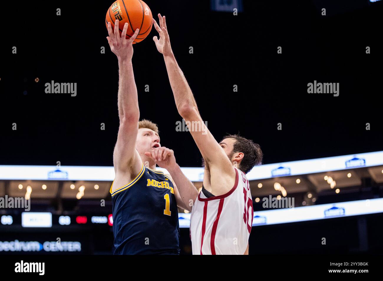 Charlotte, NC, USA. 18th Dec, 2024. Michigan Wolverines center Danny ...