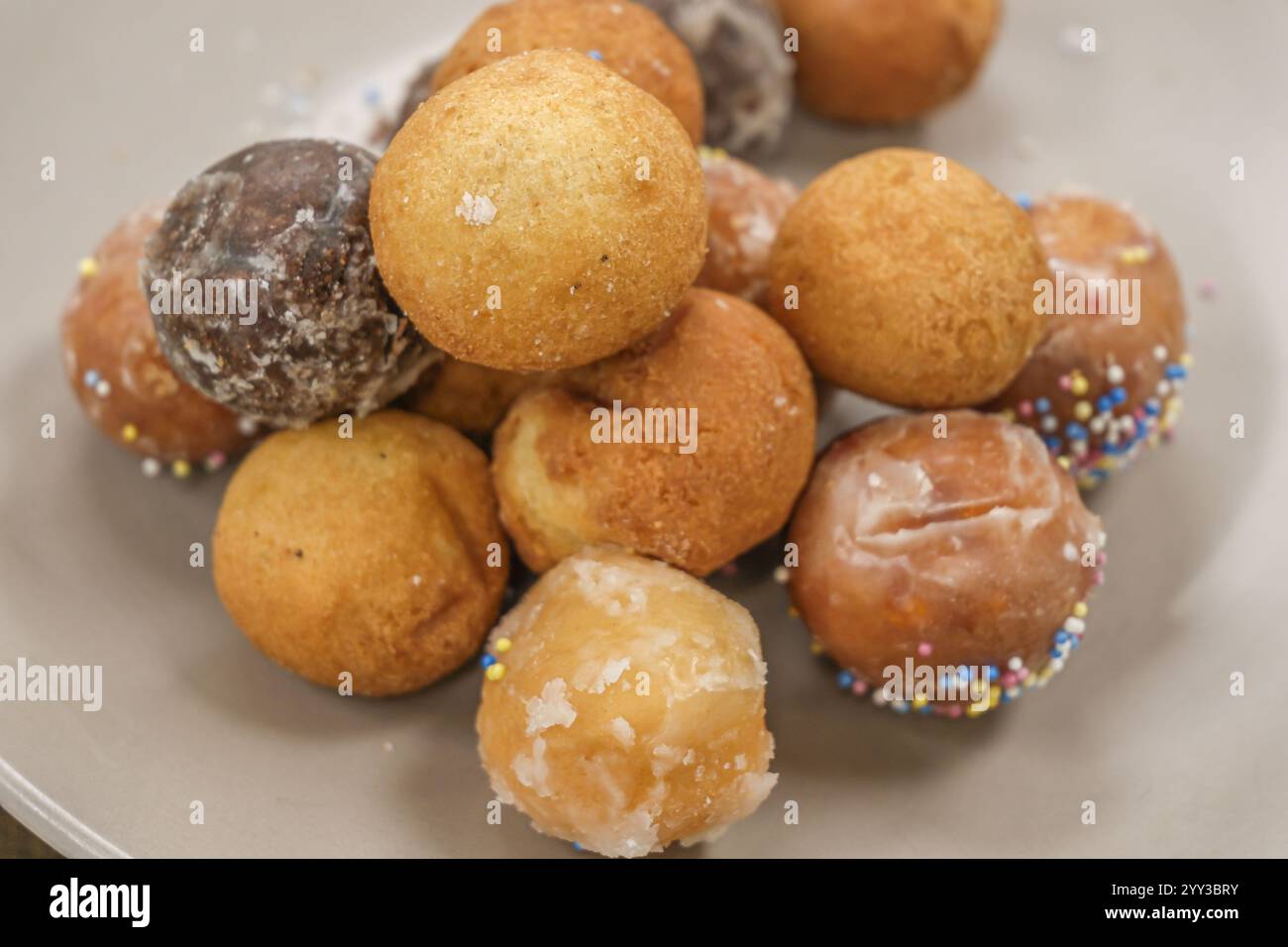 Set of mini size bite size donuts snack Stock Photo - Alamy
