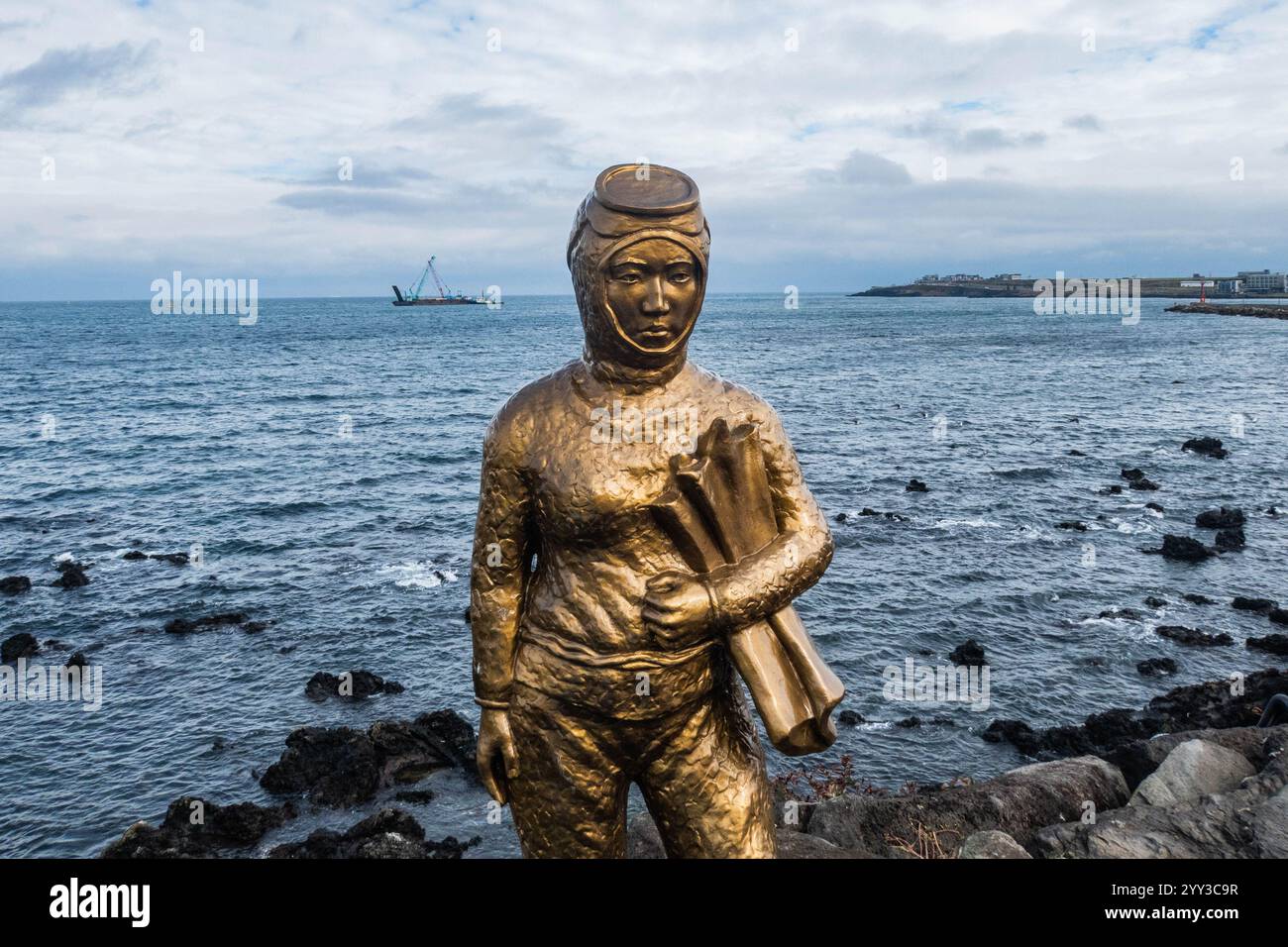 Haenyo woman diver statue along the Jeju Olle Trail, Jeju Island, South ...