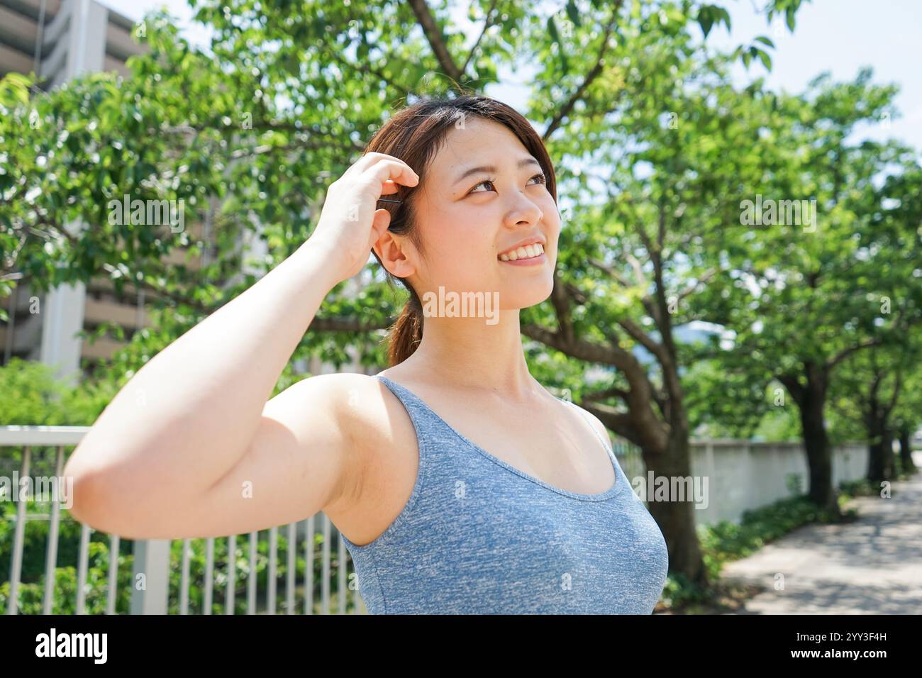 Young woman sweating outdoors Stock Photo - Alamy