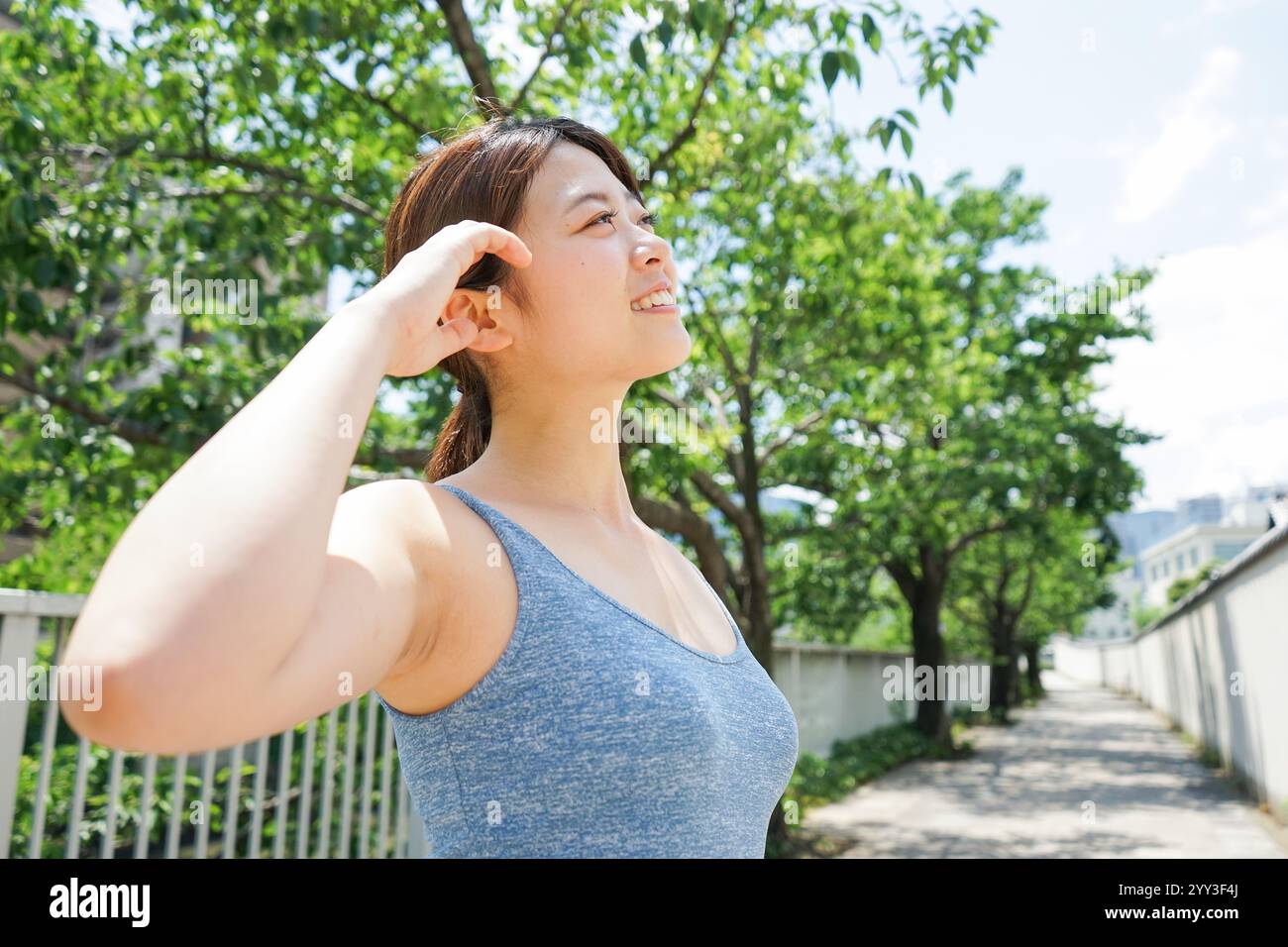 Young woman sweating outdoors Stock Photo - Alamy