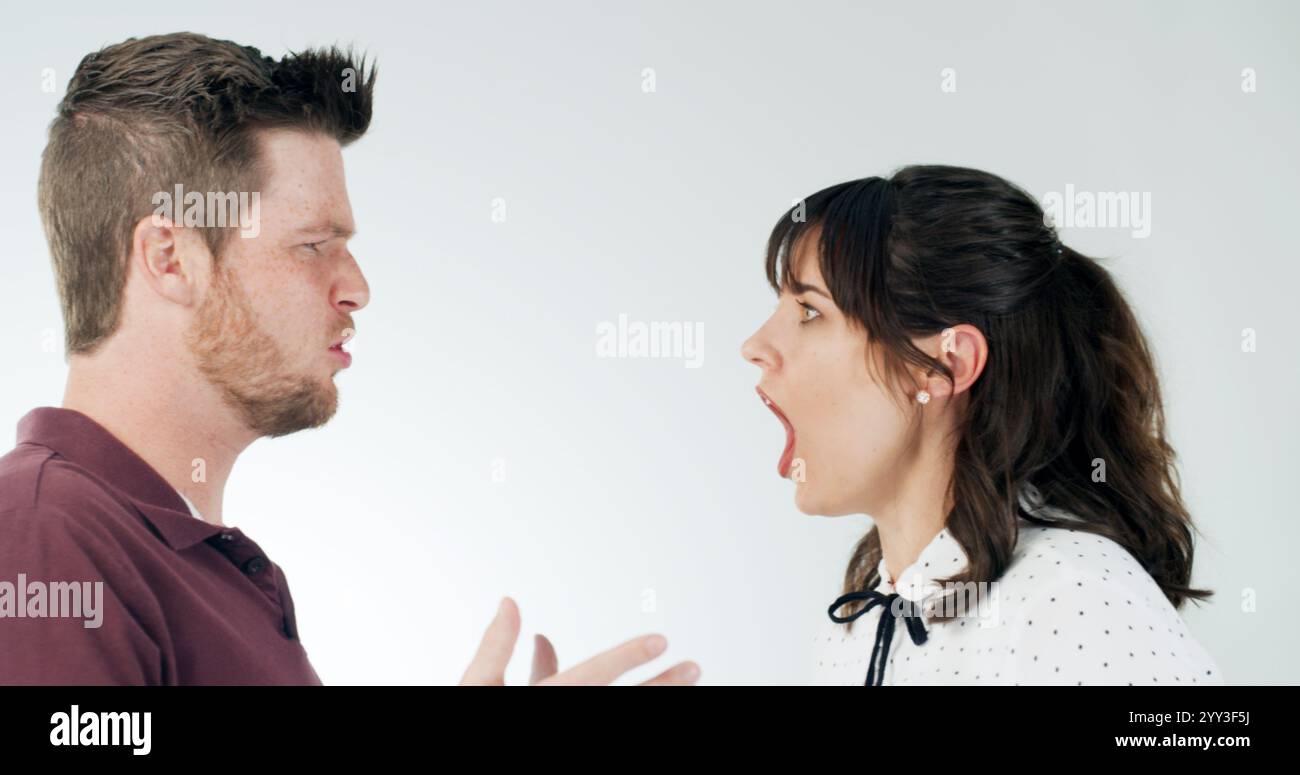 Angry couple, shouting and argument with disagreement for conflict ...