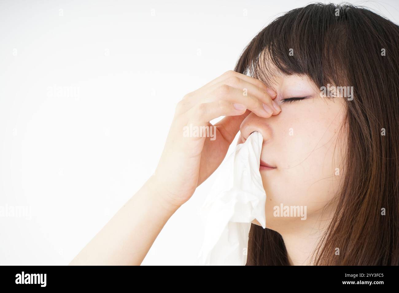 Young woman with bloody nose Stock Photo - Alamy
