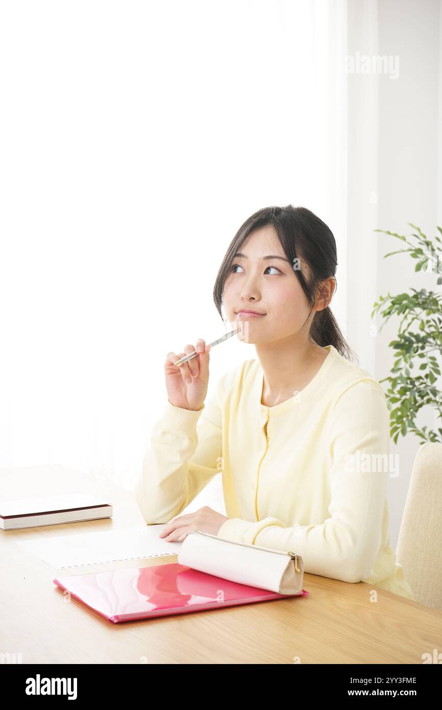 Young woman studying Stock Photo - Alamy