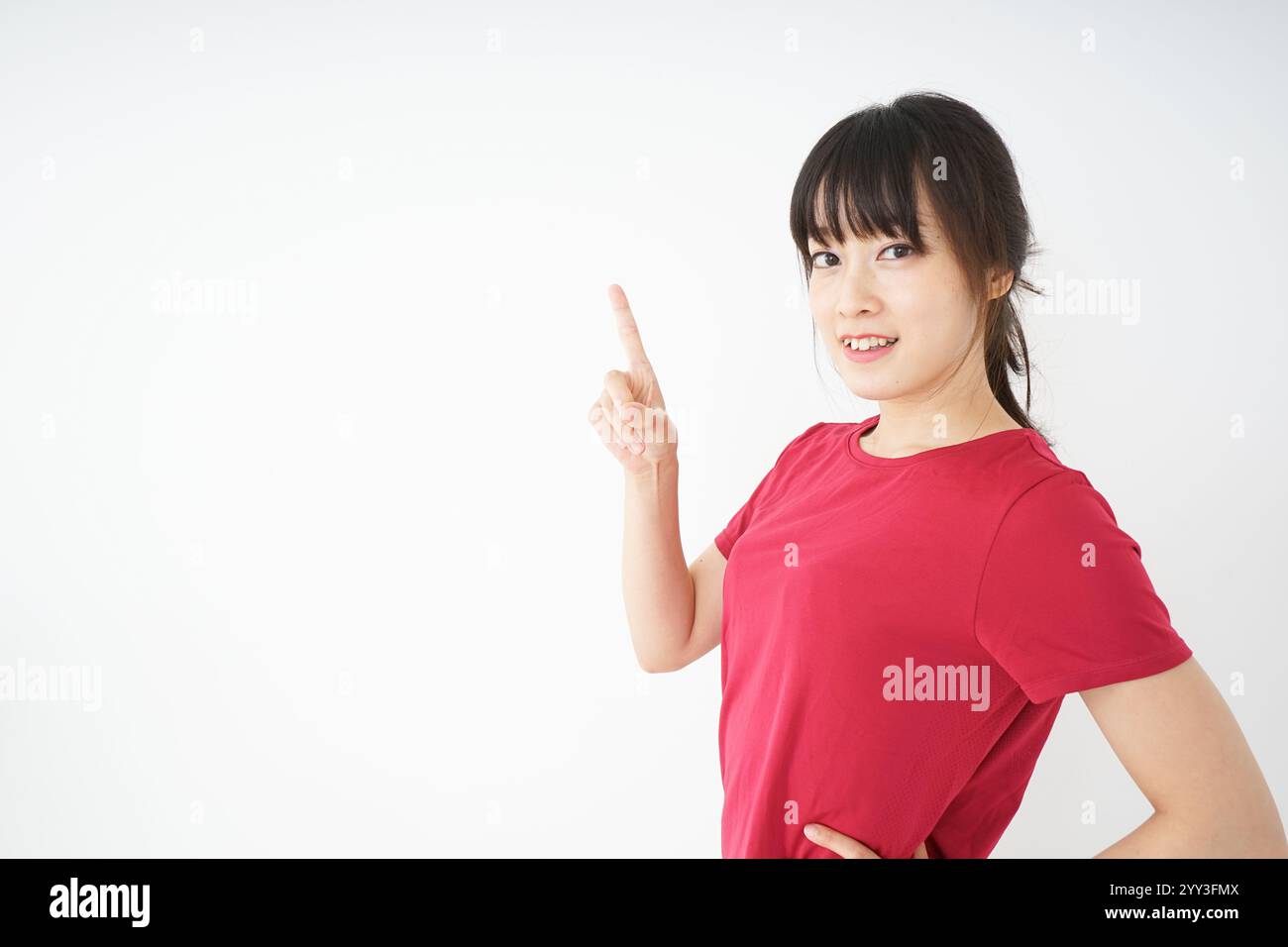 Sports instructor pointing finger Stock Photo - Alamy