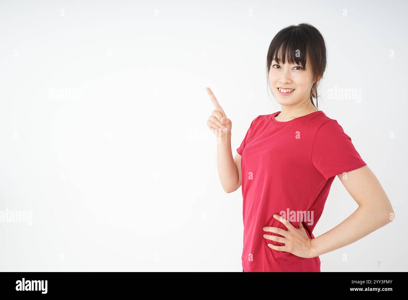 Sports instructor pointing finger Stock Photo - Alamy