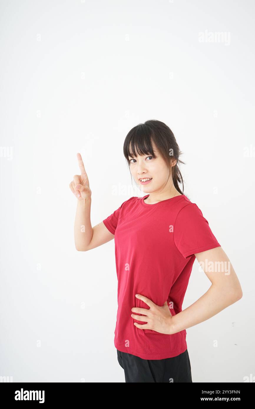 Sports instructor pointing finger Stock Photo - Alamy