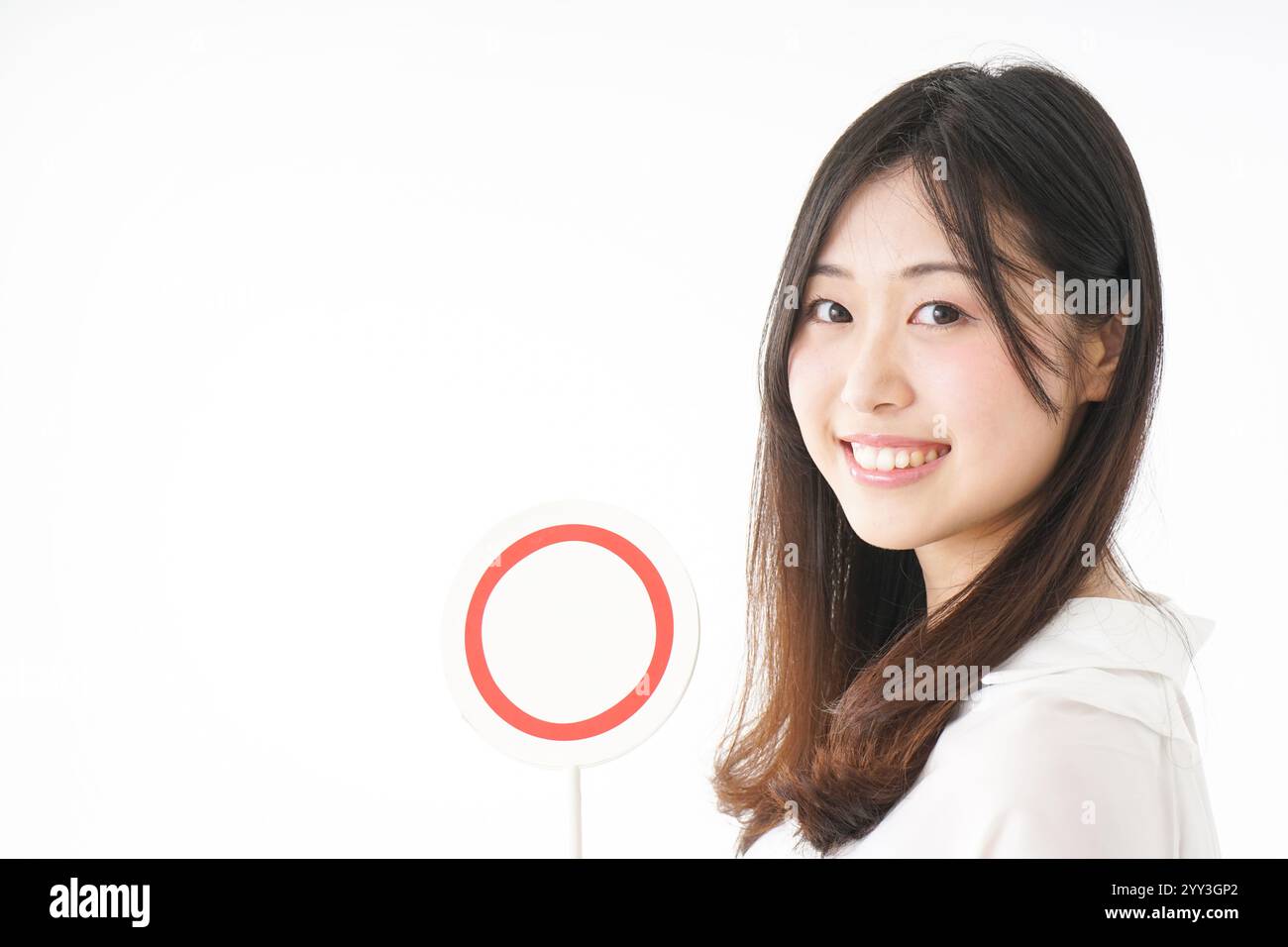 Young woman showing a circle sign Stock Photo - Alamy