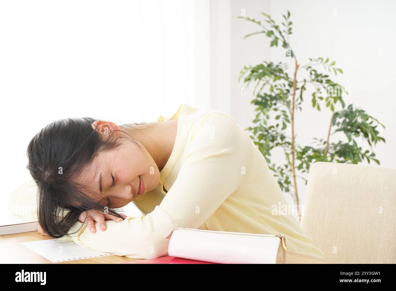 Sleep-deprived young woman Stock Photo - Alamy