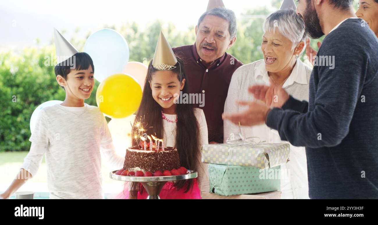 Birthday cake, big family and girl happy with parents for celebration ...