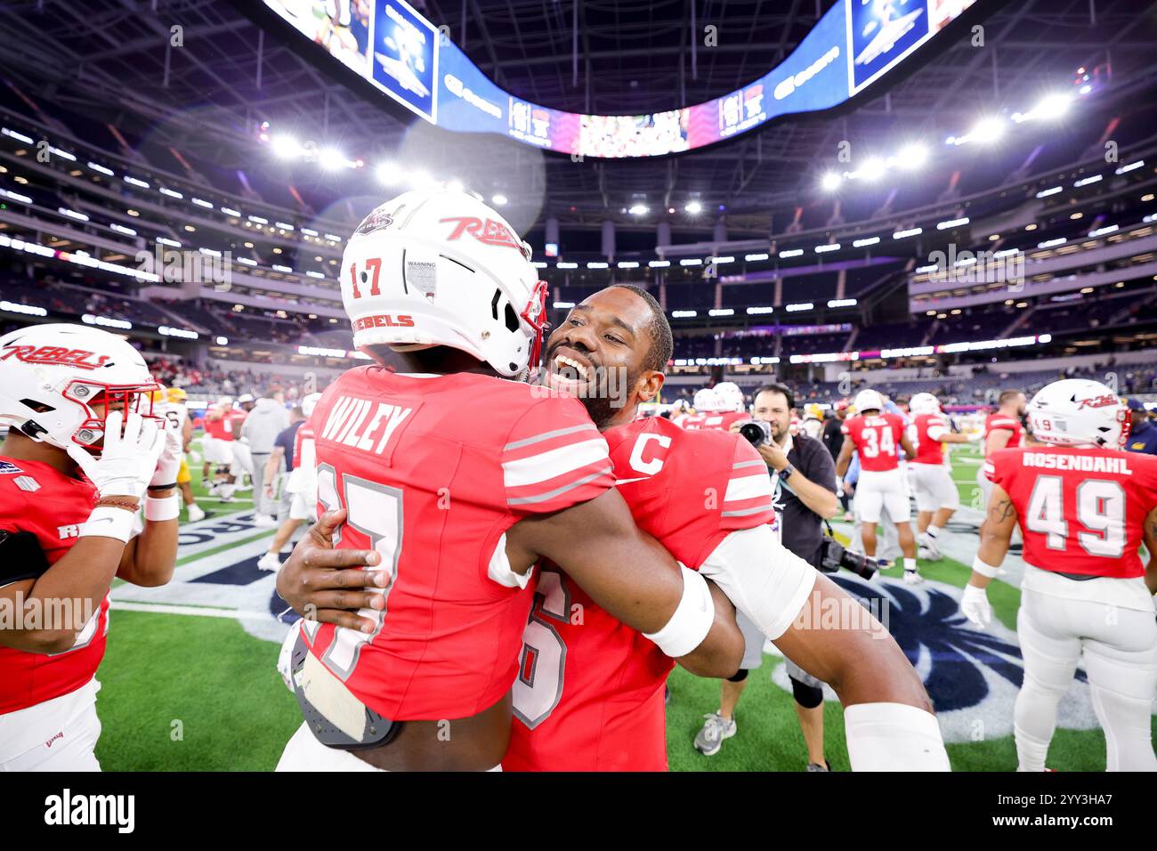 UNLV quarterback Hajj-Malik Williams, right, celebrates with defensive ...