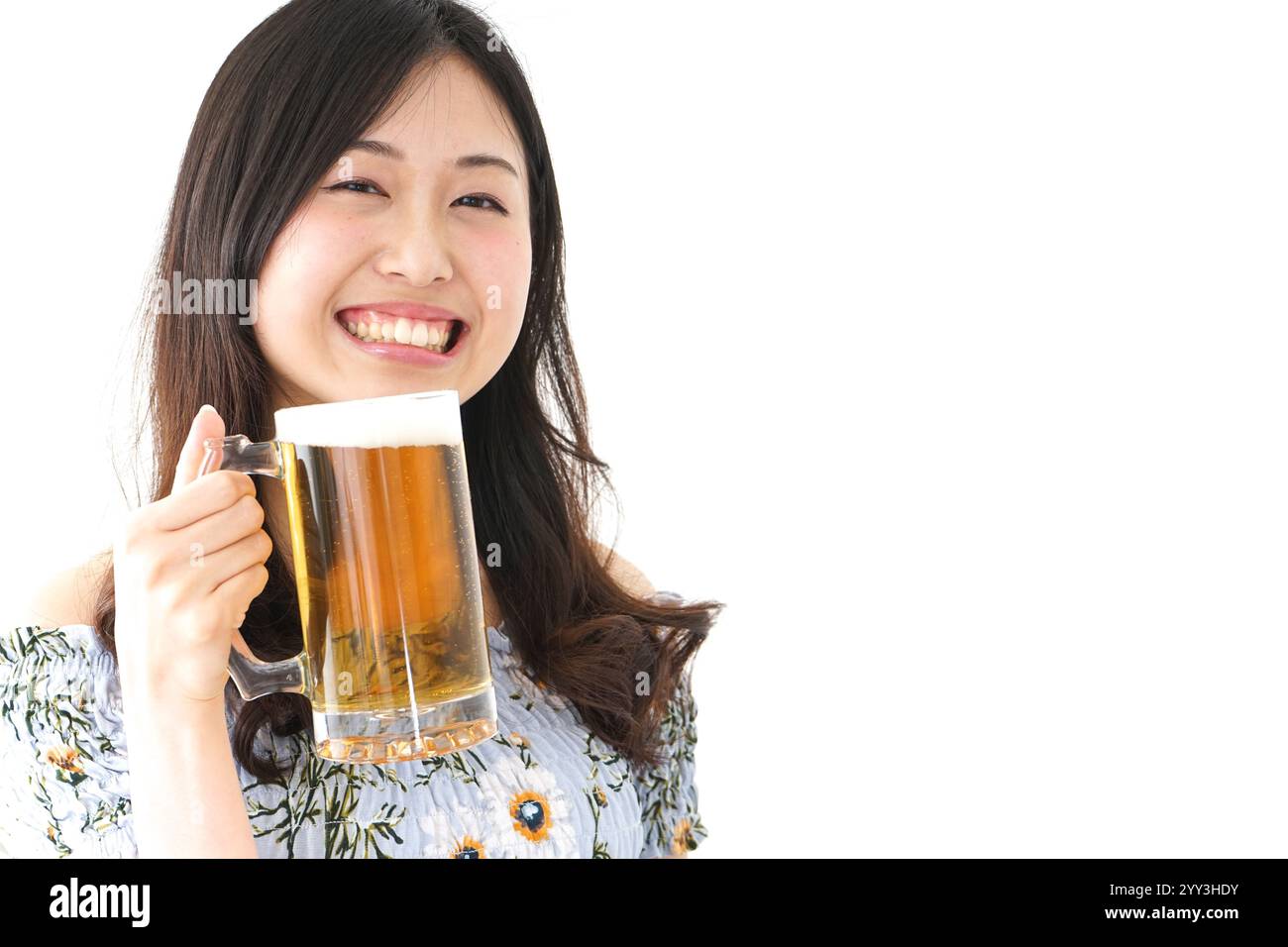 Young woman drinking beer in beer garden Stock Photo - Alamy