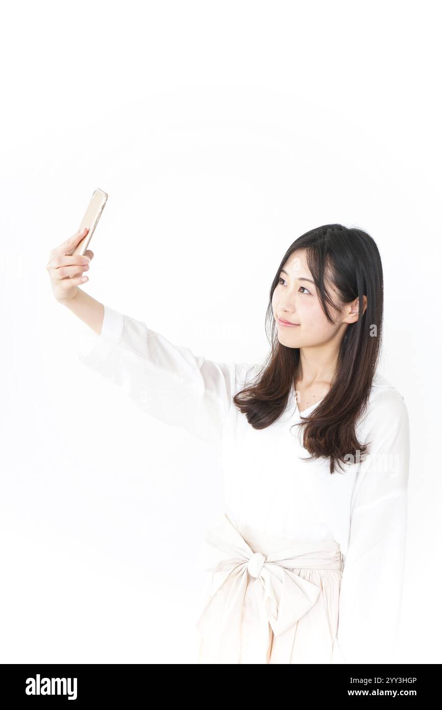 Woman makeup selfie in hi-res stock photography and images - Alamy