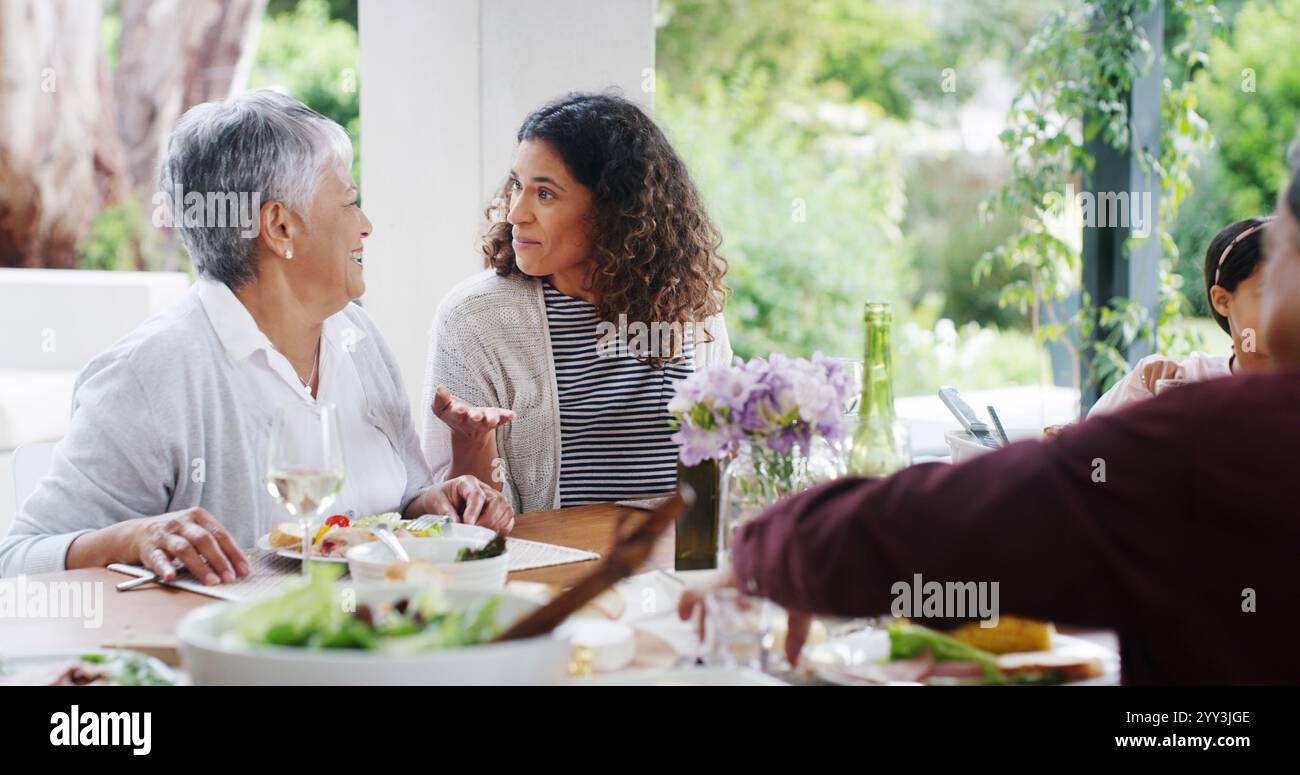 Thanksgiving, dinner and women with talking by home for bonding ...