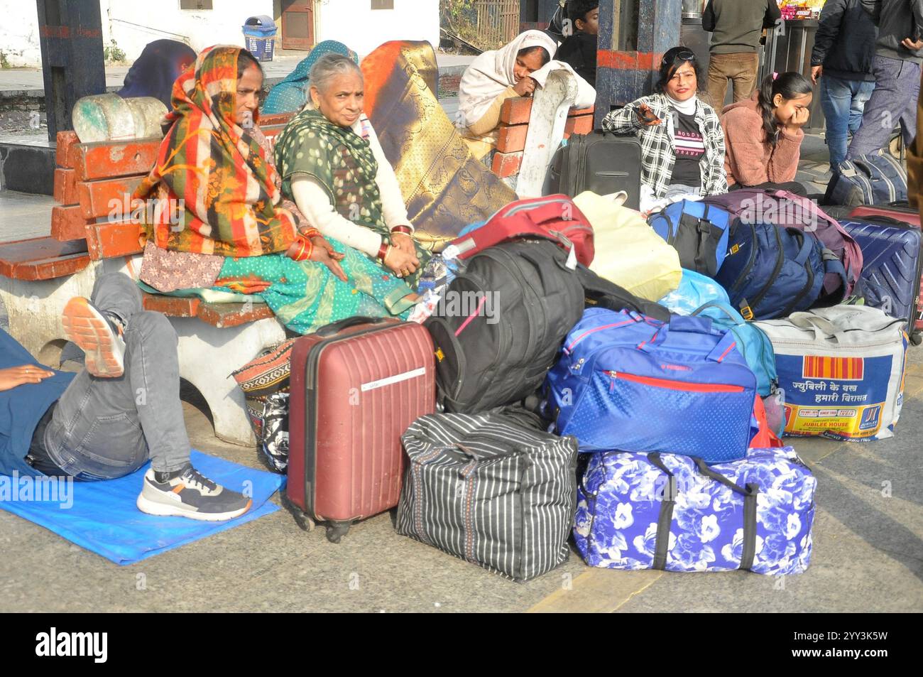 AMRITSAR, INDIA - DECEMBER 18: Passengers stranded at railway station ...