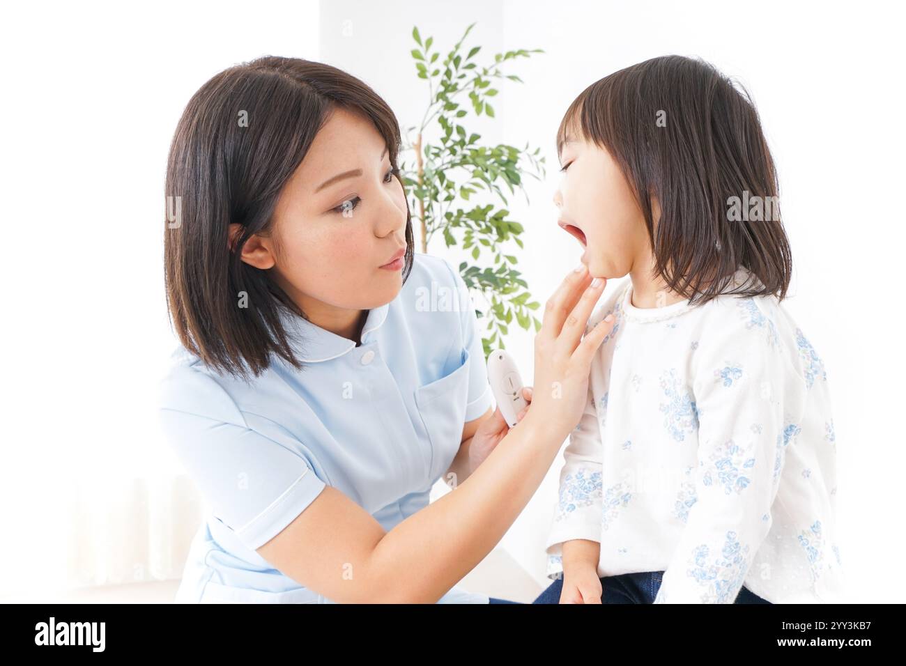 Child undergoing dental treatment Stock Photo - Alamy