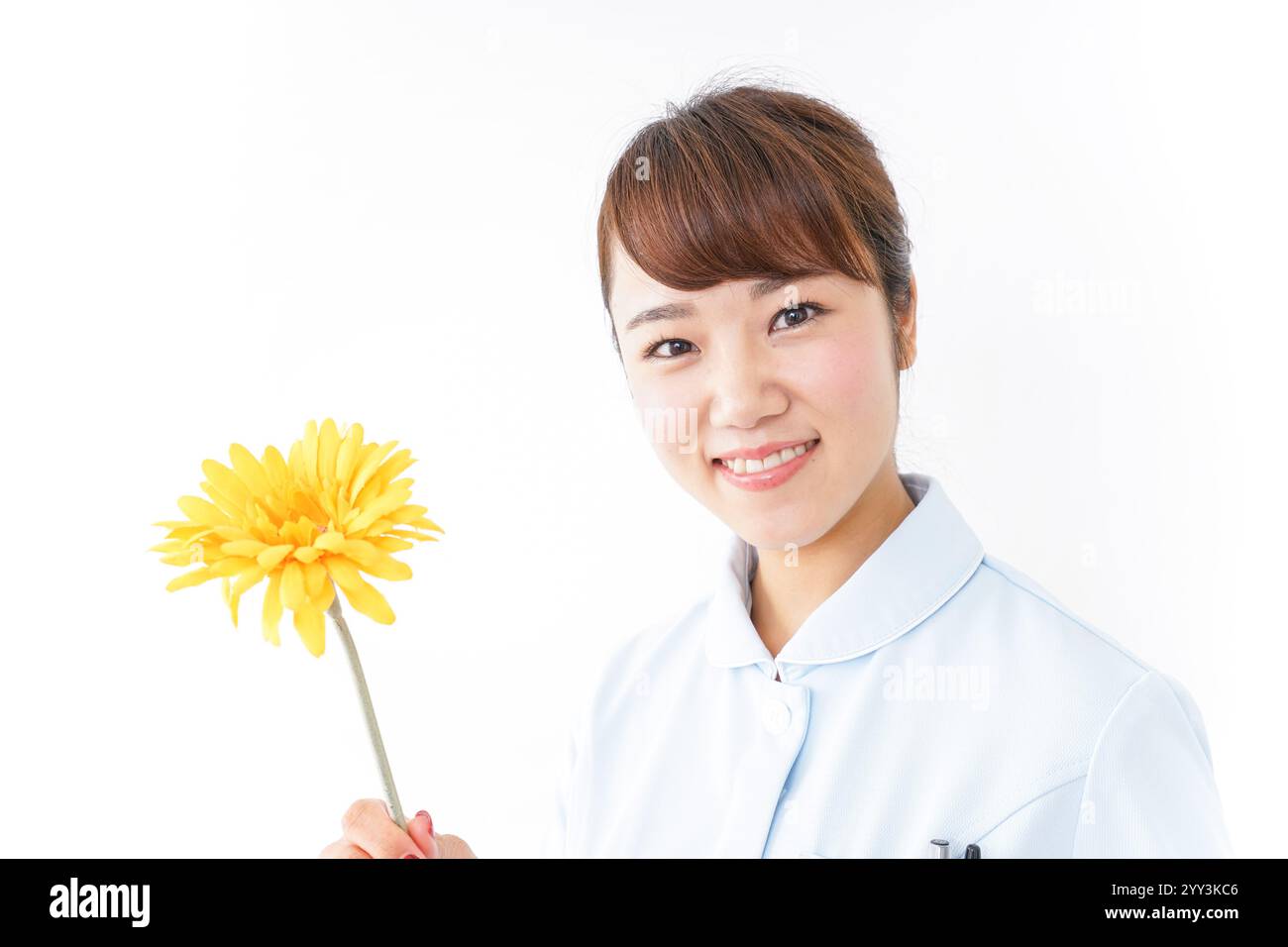Female doctor nurse yellow hi-res stock photography and images - Alamy