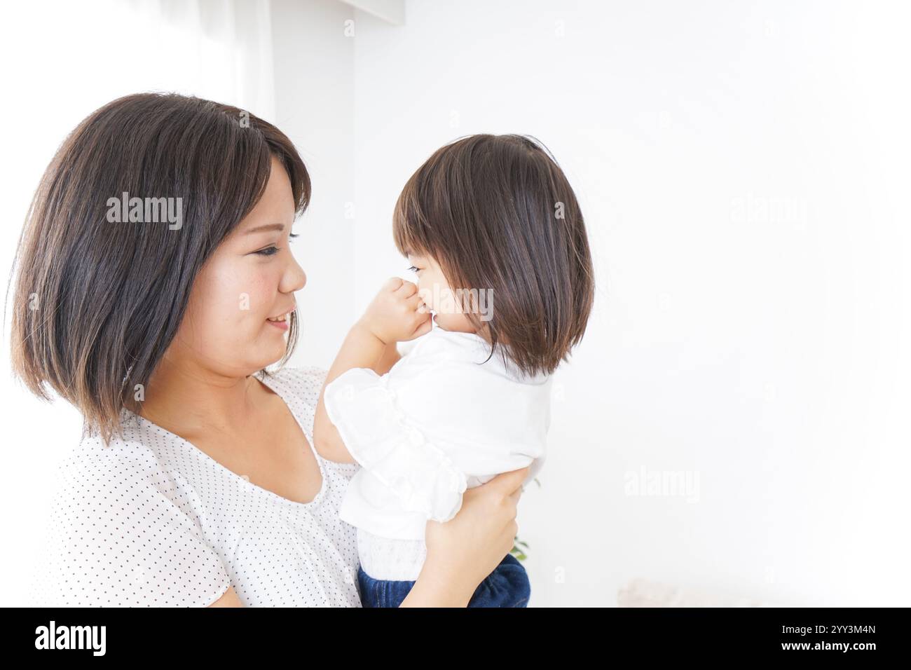 Child mother cradle hi-res stock photography and images - Alamy