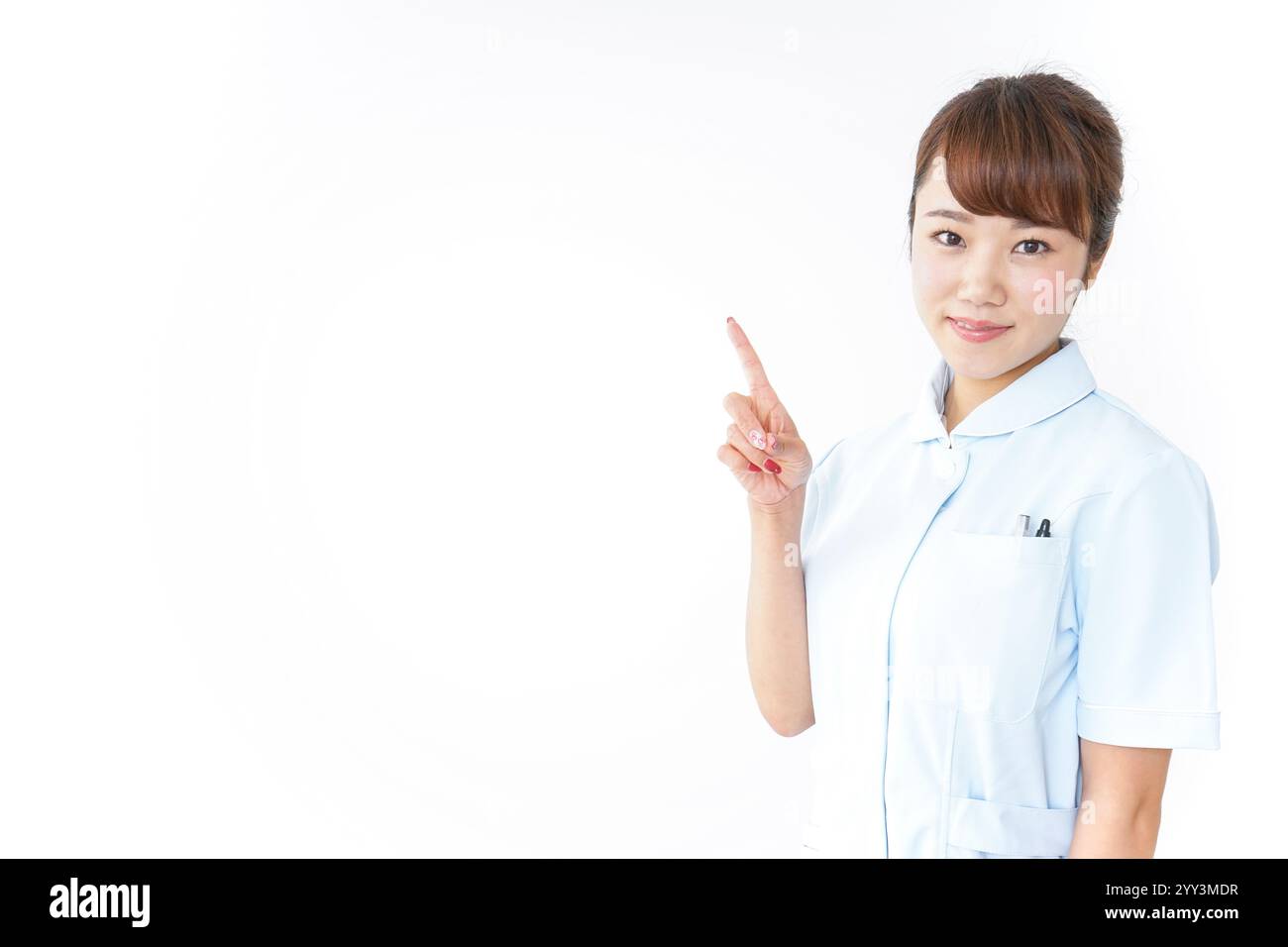 Nurse pointing finger Stock Photo - Alamy