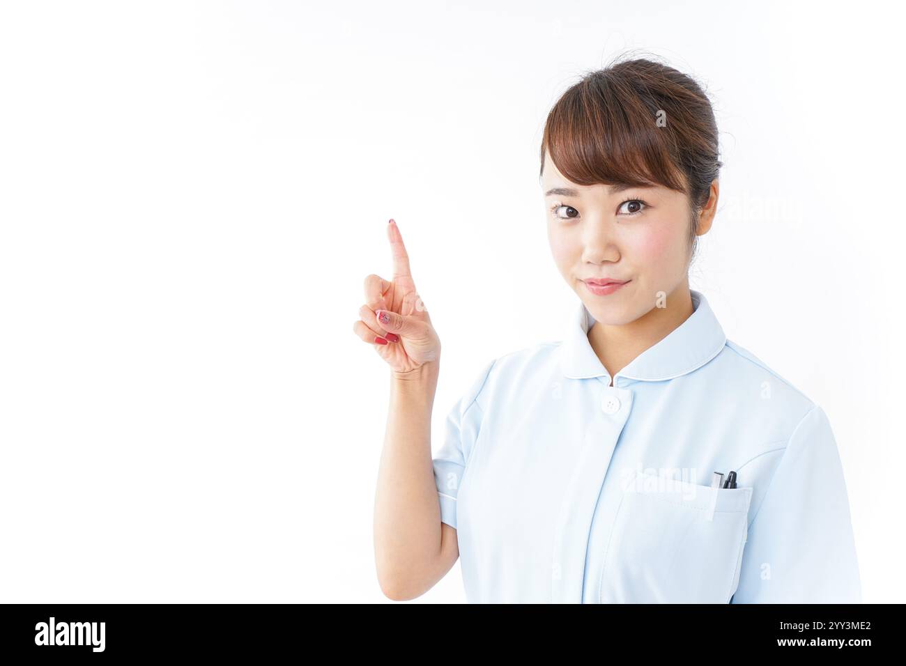 Nurse pointing finger Stock Photo - Alamy