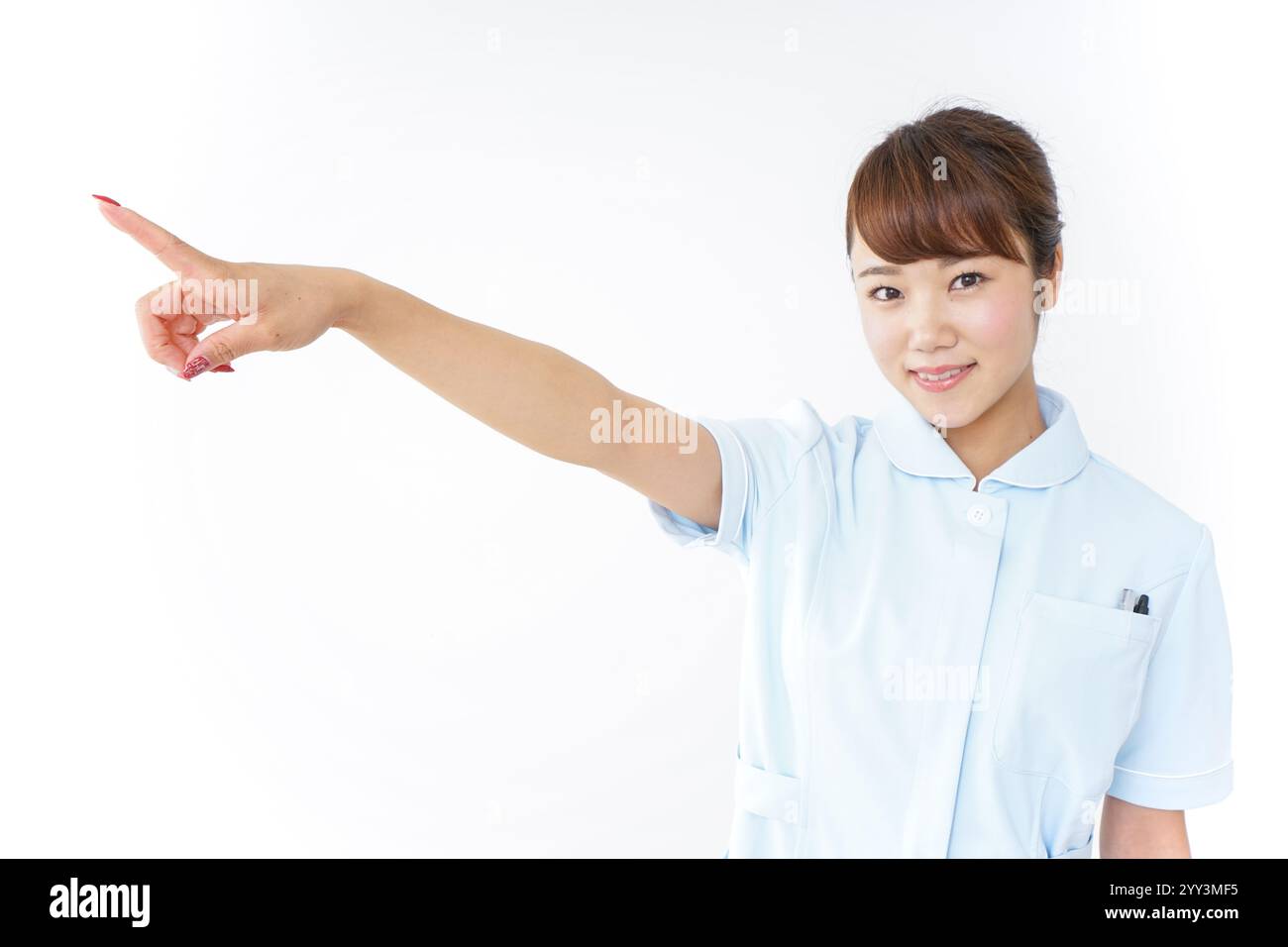 Nurse pointing finger Stock Photo - Alamy