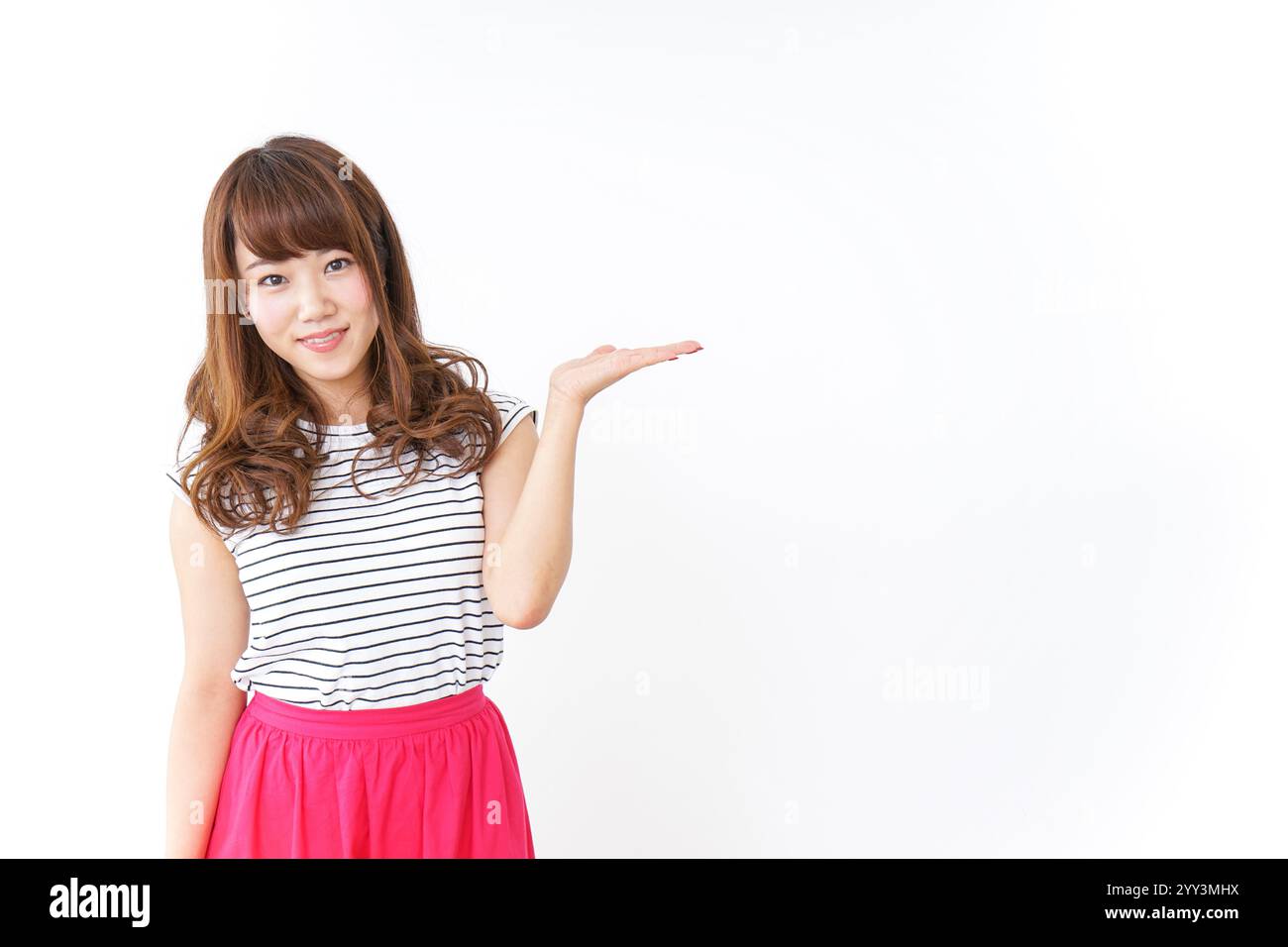 Woman pointing finger Stock Photo - Alamy