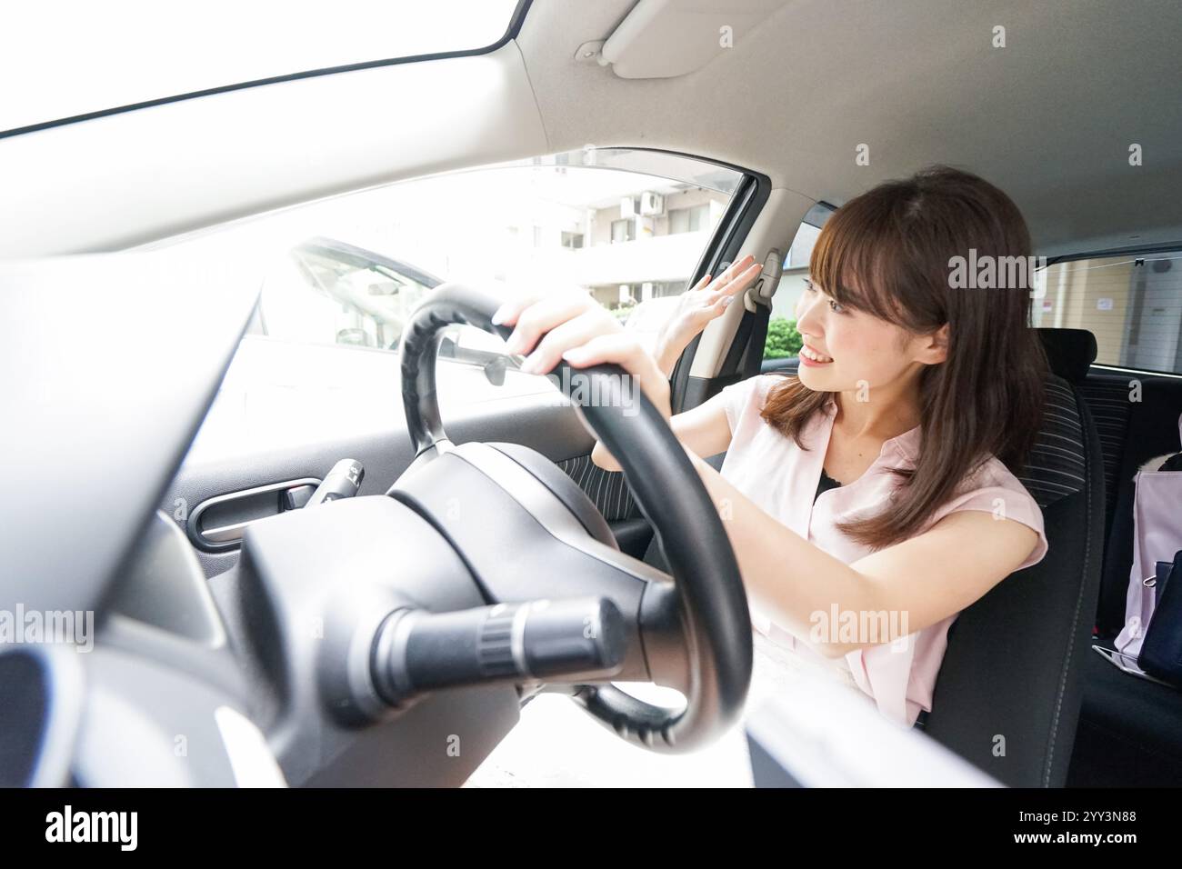 Driver waving hi-res stock photography and images - Alamy
