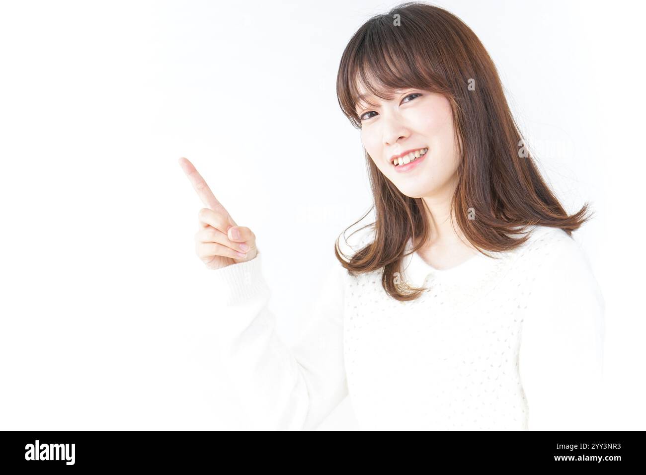 Woman pointing finger Stock Photo - Alamy