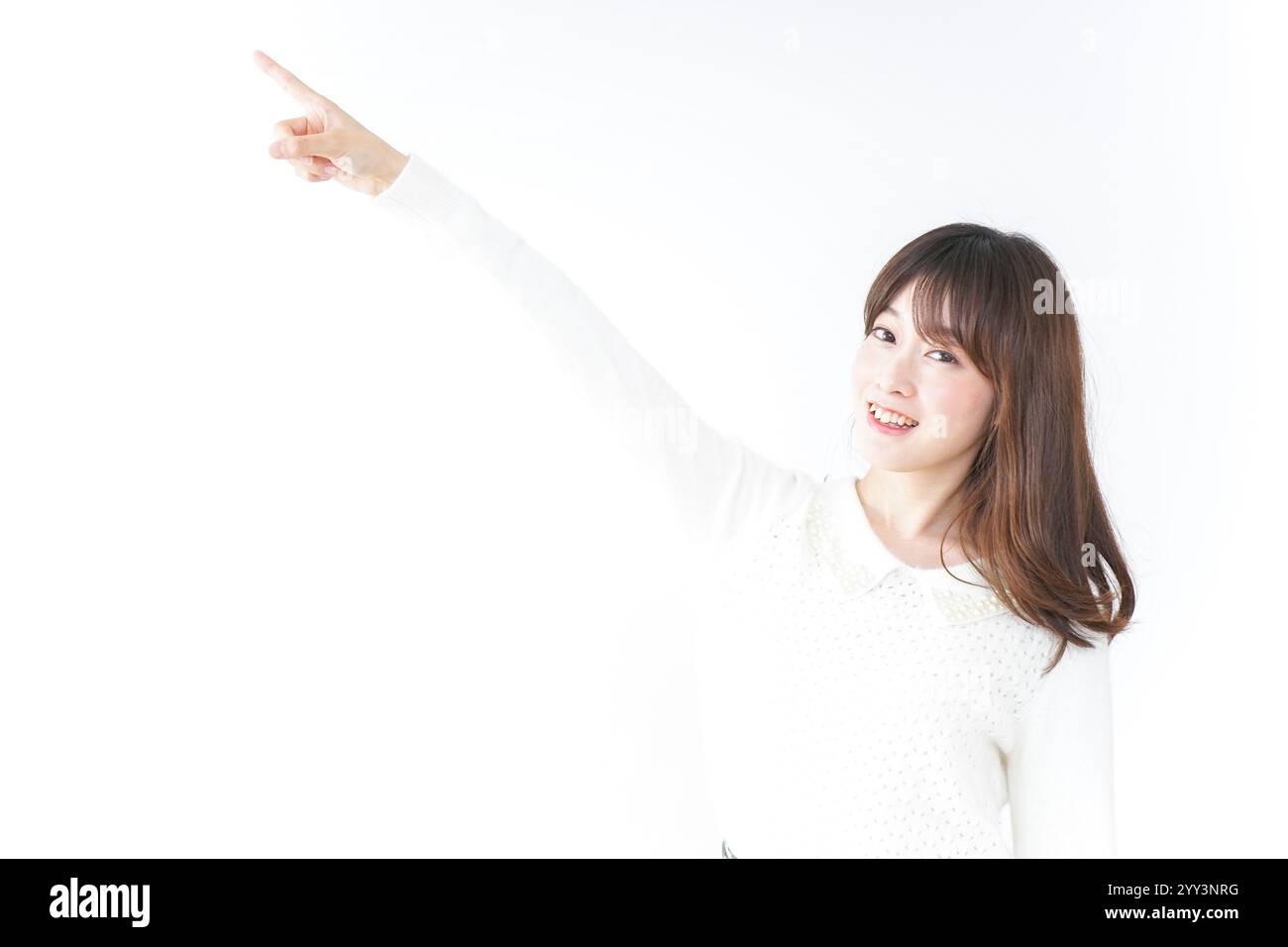 Woman pointing finger Stock Photo - Alamy