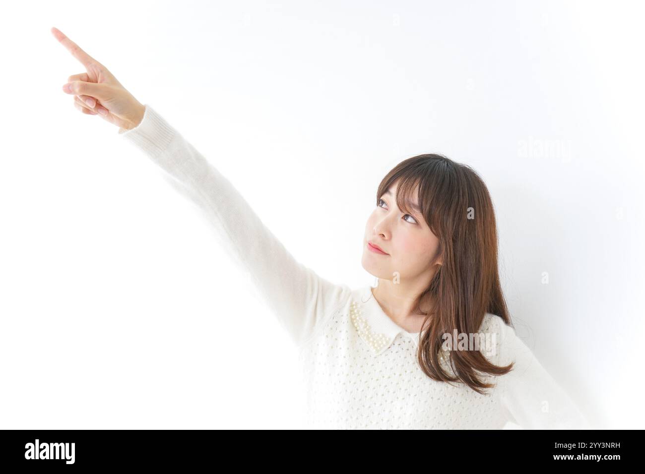 Woman pointing finger Stock Photo - Alamy