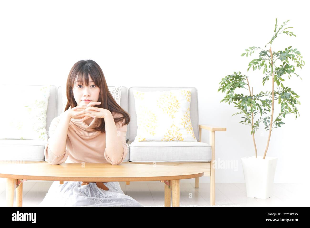 Woman relaxing at home Stock Photo - Alamy