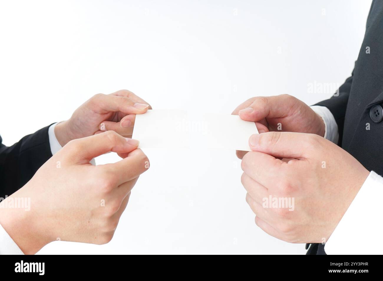 Businessperson exchanging business cards Stock Photo - Alamy