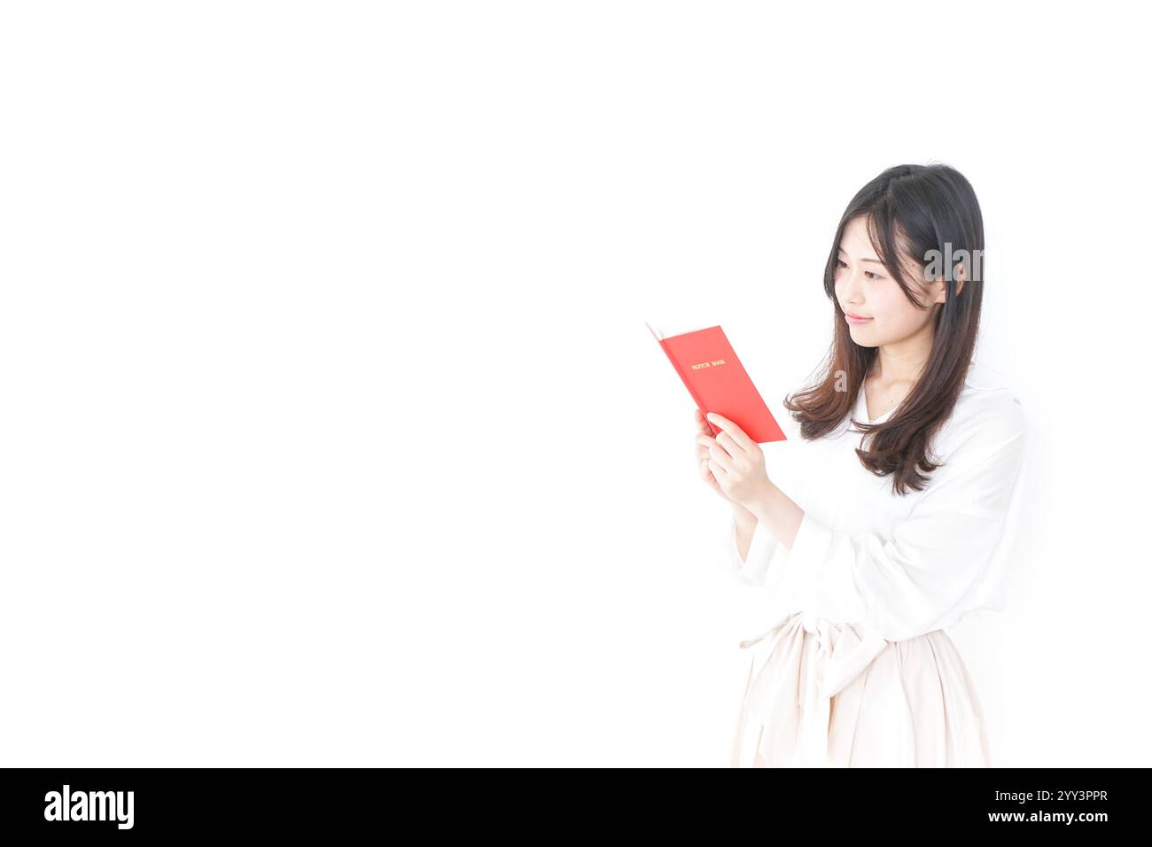 Woman taking notes Stock Photo - Alamy