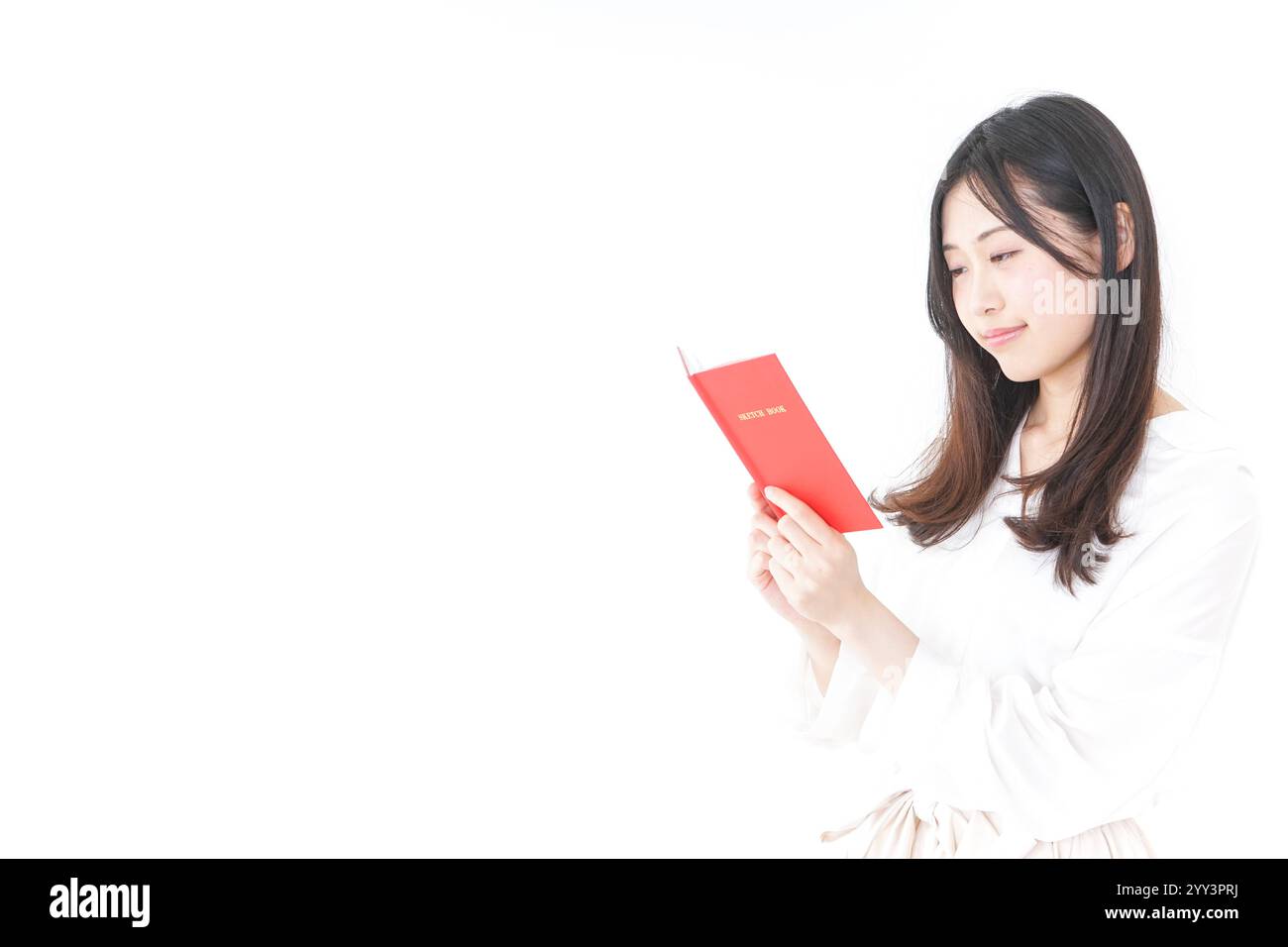 Woman taking notes Stock Photo - Alamy