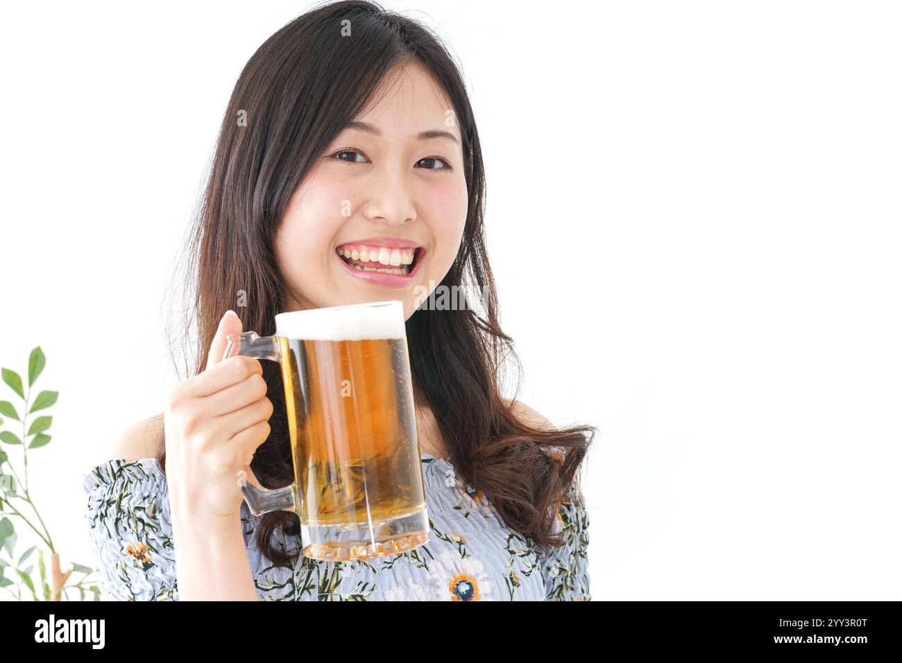 Woman drinking beer in beer garden Stock Photo - Alamy