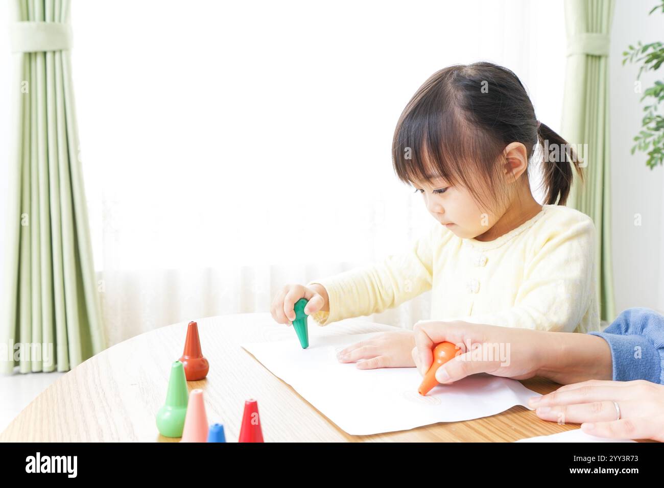 Parent and child drawing Stock Photo - Alamy