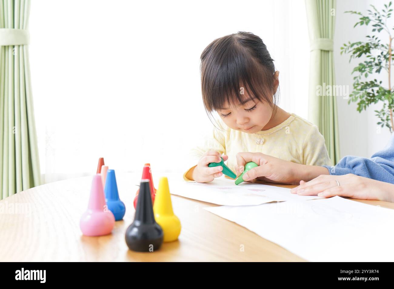 Parent and child drawing Stock Photo - Alamy