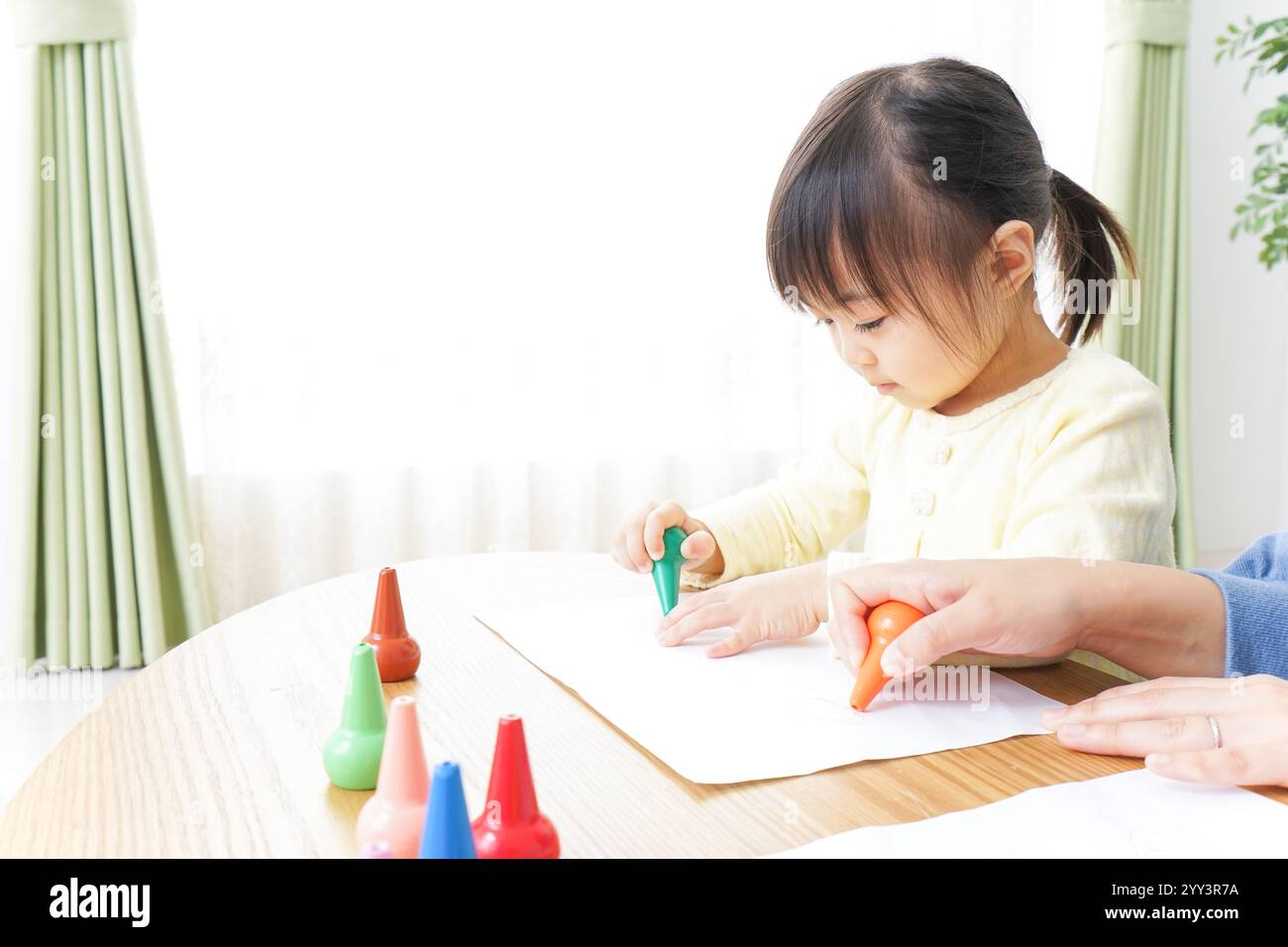 Parent and child drawing Stock Photo - Alamy