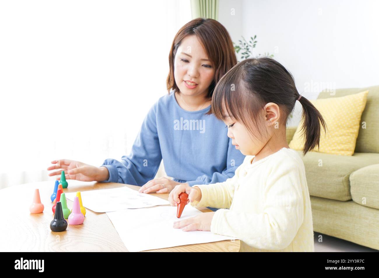 Parent and child drawing Stock Photo - Alamy