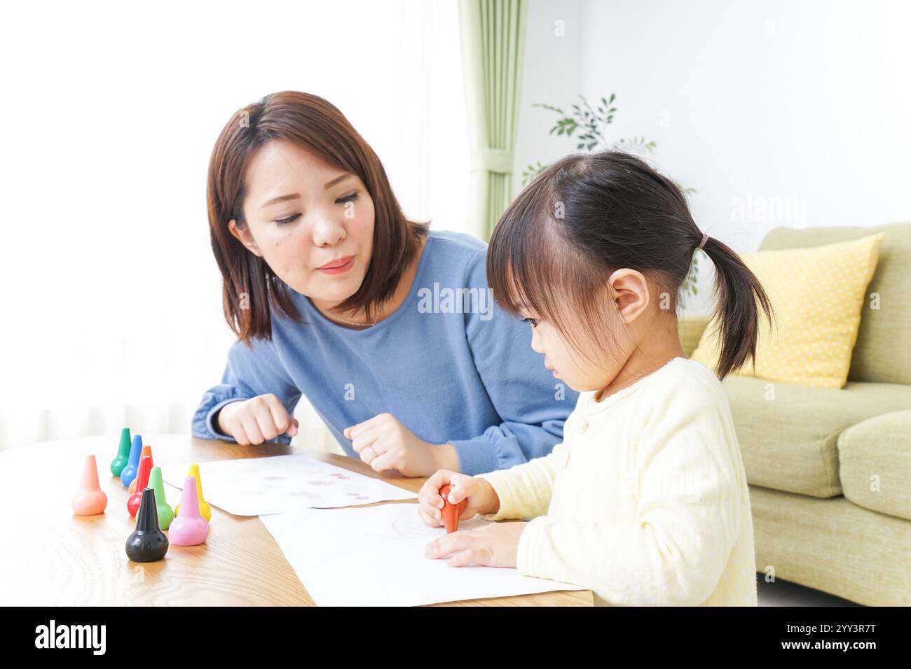 Parent and child drawing Stock Photo - Alamy