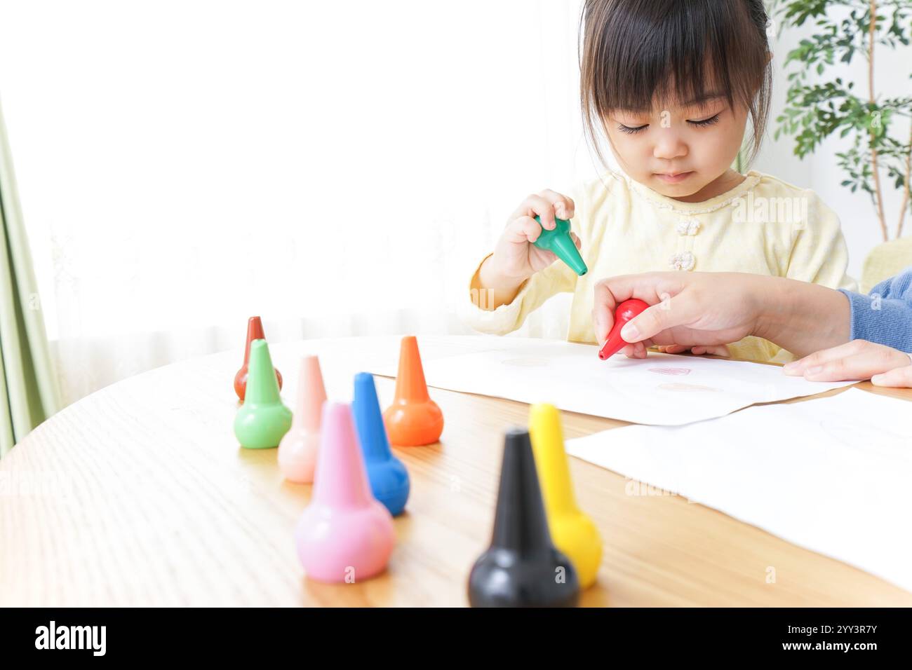 Parent and child drawing Stock Photo - Alamy