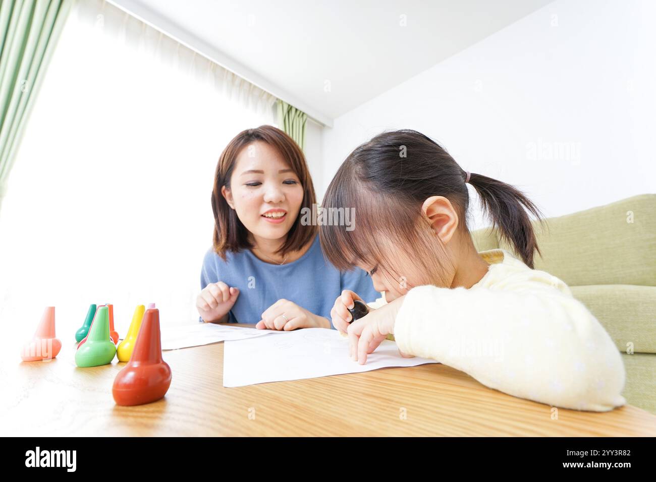 Parent and child drawing Stock Photo - Alamy