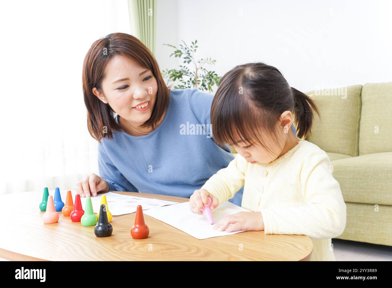 Parent and child drawing Stock Photo - Alamy